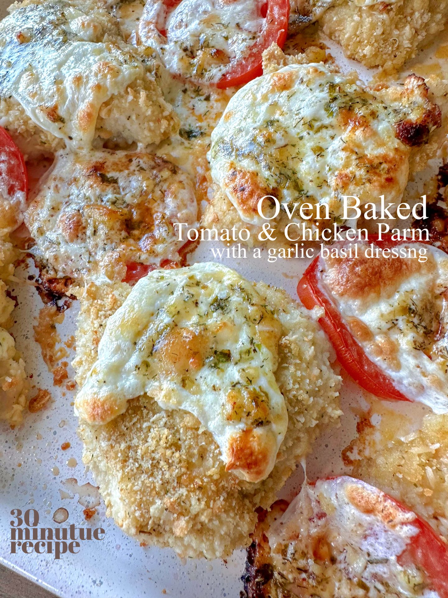 Oven-baked tomato & chicken parm with a garlic basil dressing